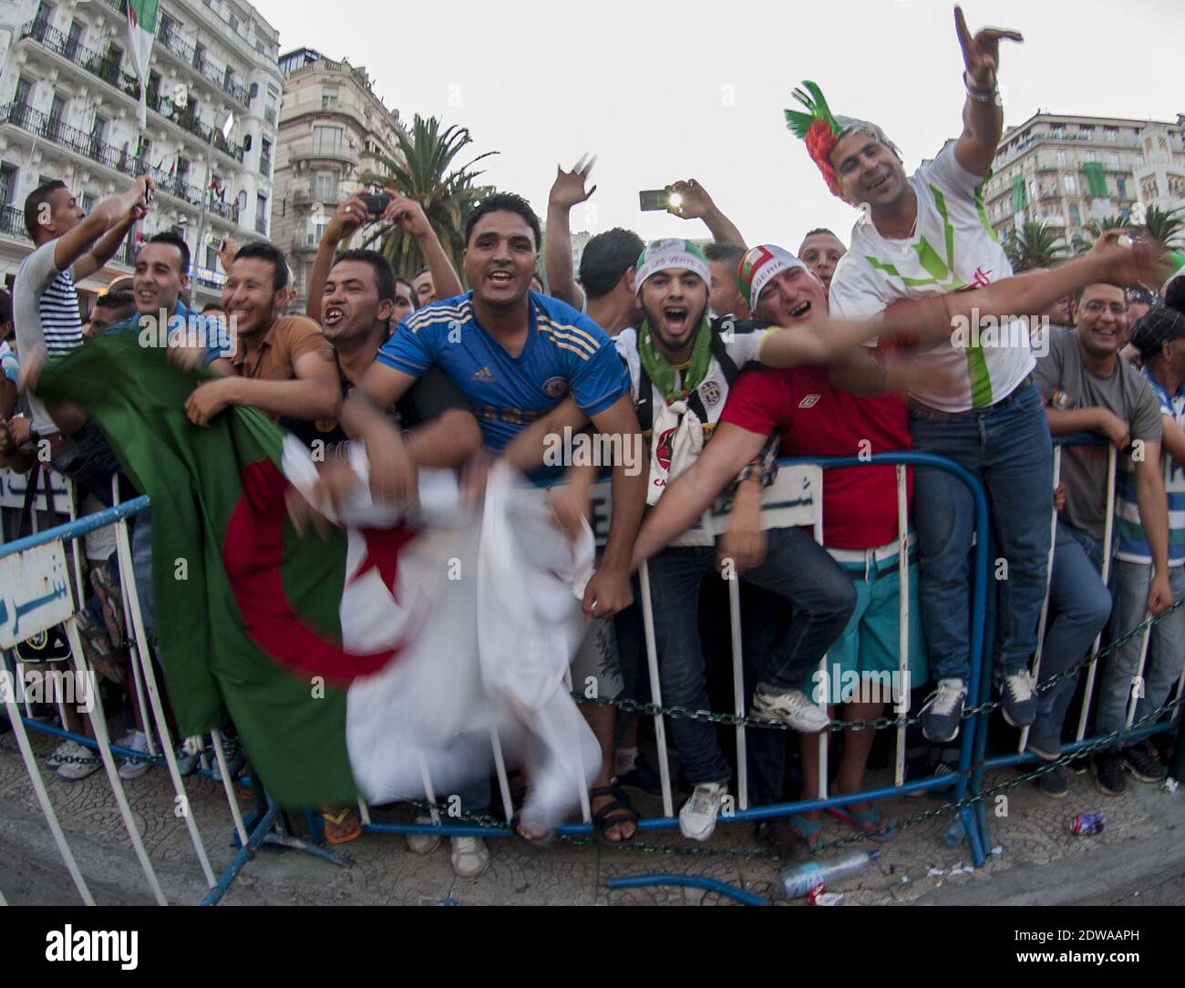 Soccer fans celebrate in Algiers, on June 26, 2014 after Algeria ...