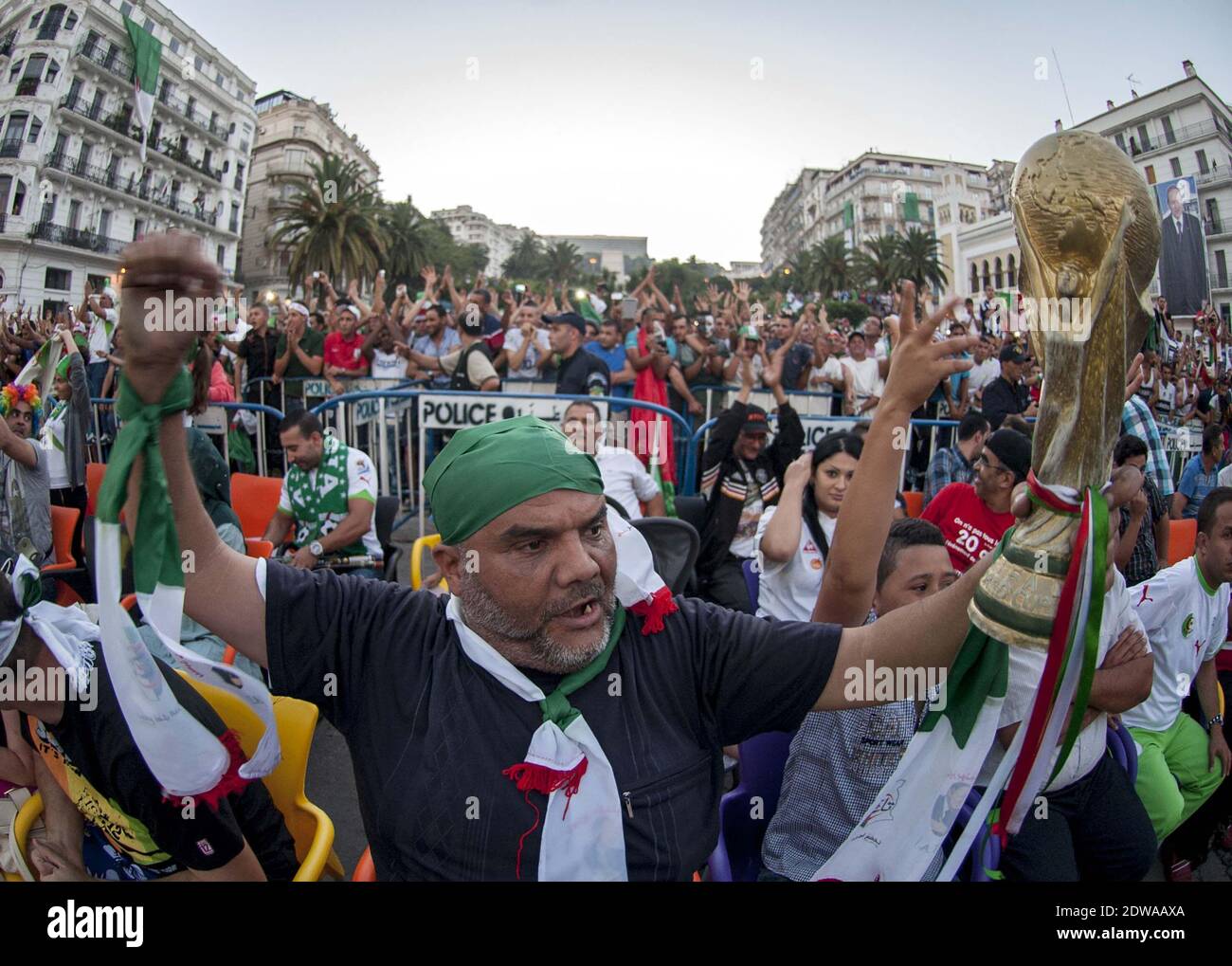 Soccer fans celebrate in Algiers, on June 26, 2014 after Algeria ...