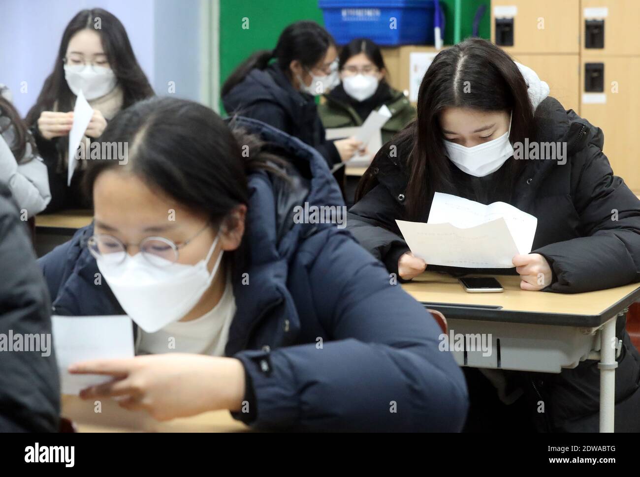 23rd Dec, 2020. Results of college entrance test Students look at their ...