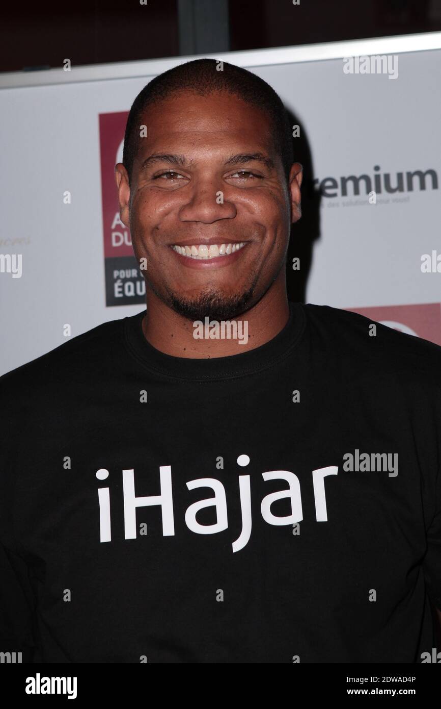 Tarik Abdul-Wahad attending the opening of "La Pierre Intelligente ...