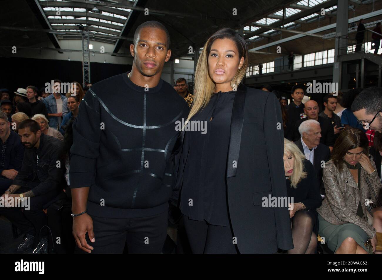 Victor Cruz and Elaina Watley attending Givenchy Spring-Summer 2015 ...