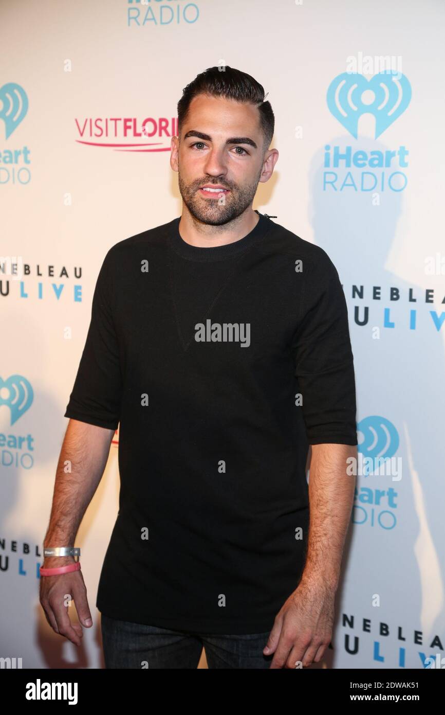 DJ E.V. attends the iHeartRadio Ultimate Pool Party at Fontainebleau ...