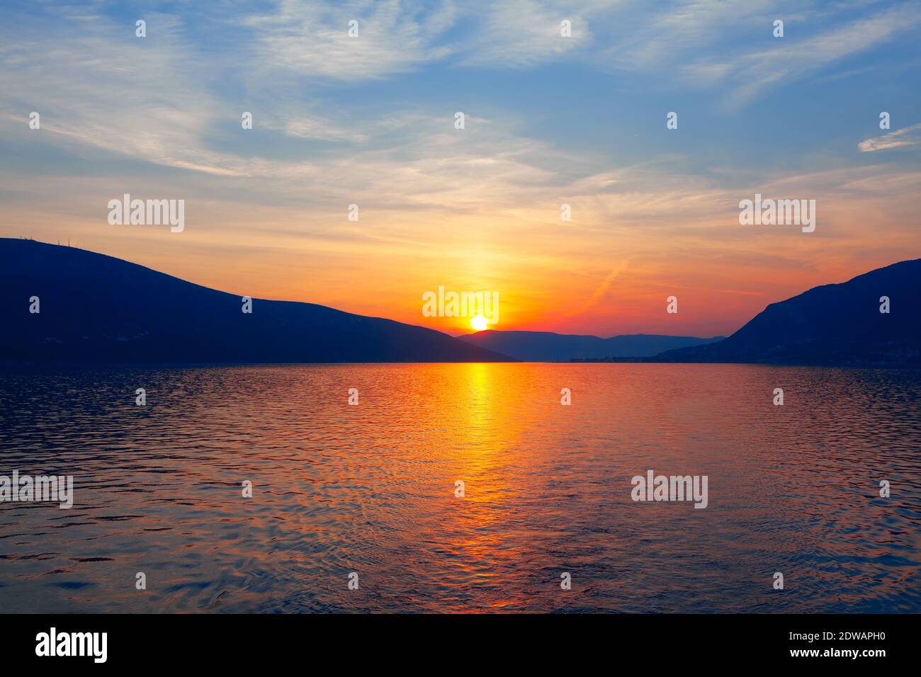 Sunset over the tide . Lagoon in the twilight Stock Photo - Alamy