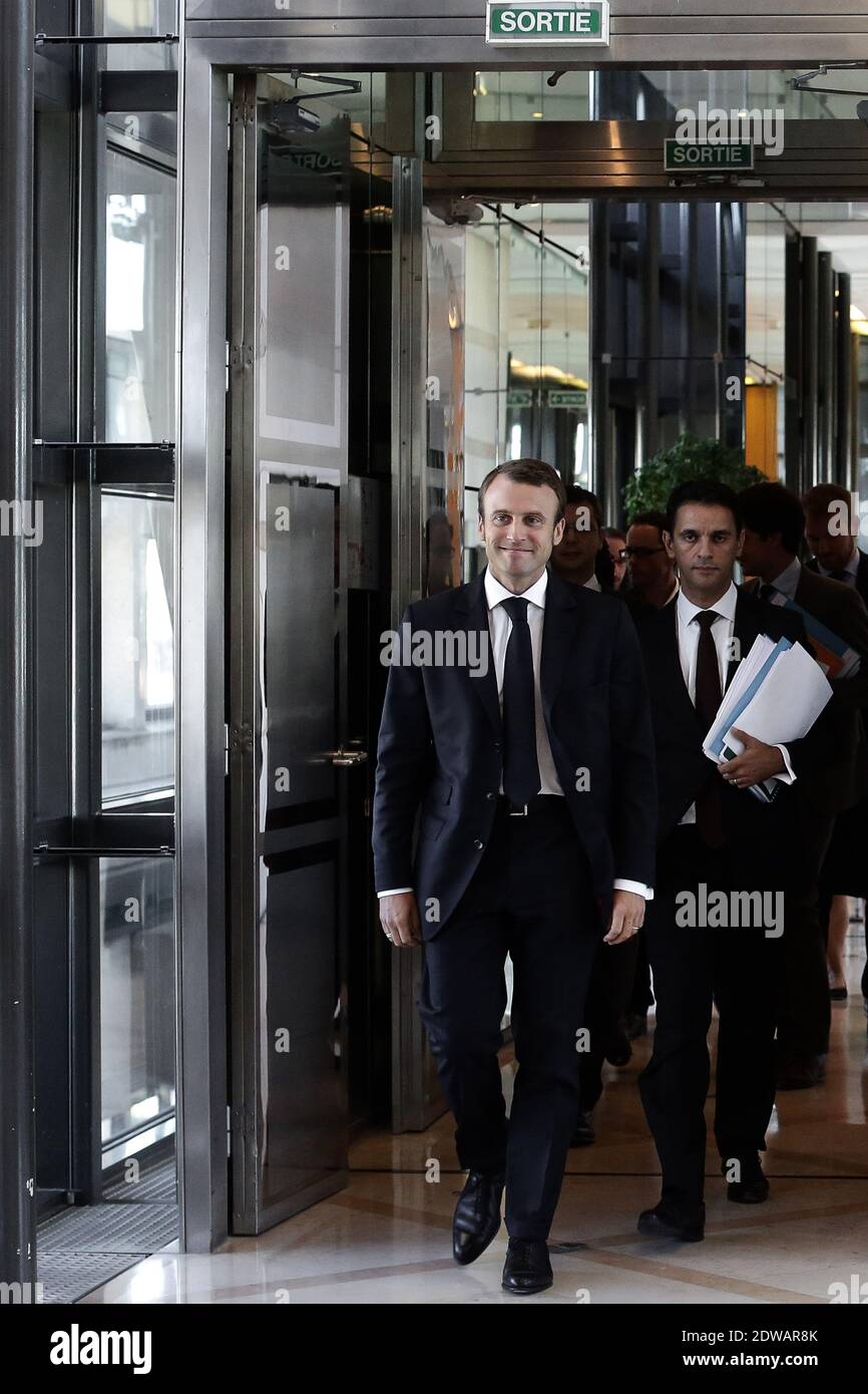 French Economy minister, Emmanuel Macron receives the chiefs of ...