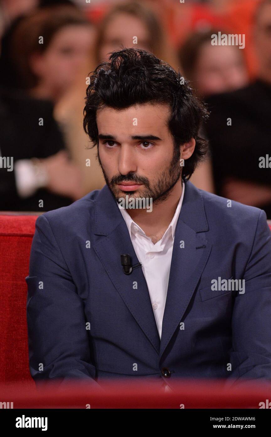 Syrus Shahidi at the taping of Vivement Dimanche on April 22, 2014 in ...