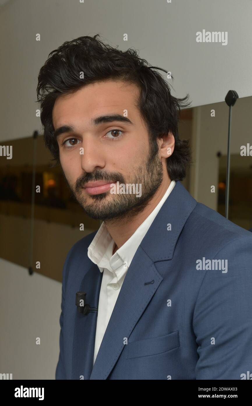 Syrus Shahidi at the taping of Vivement Dimanche on April 22, 2014 in ...