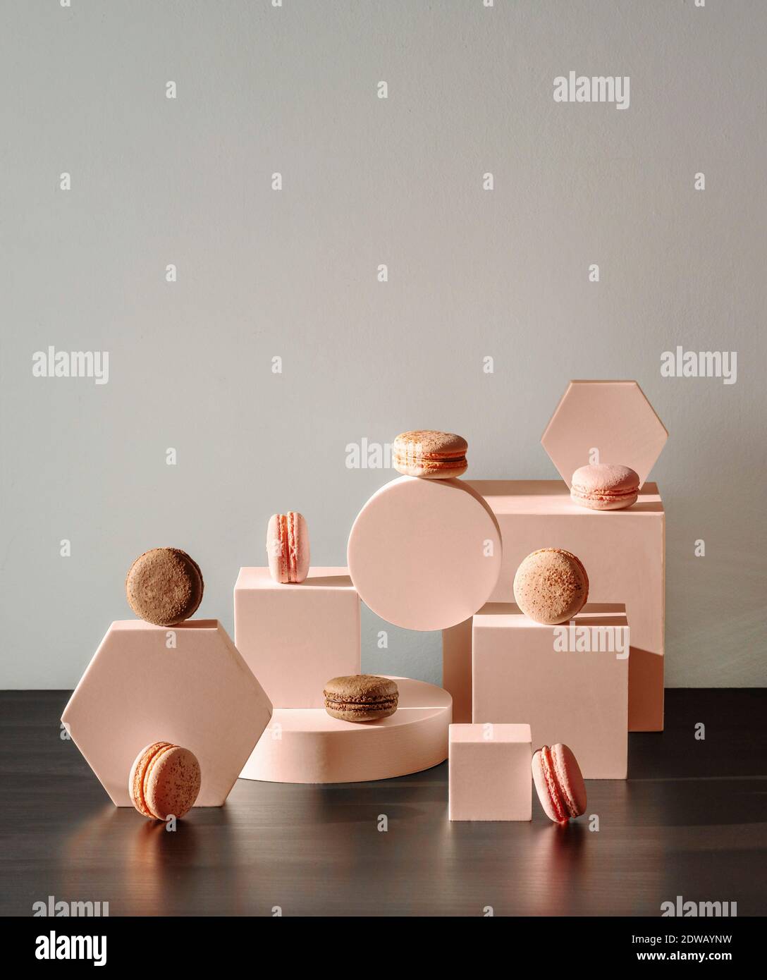 Creative shot of french macarons with geometrical shapes compositions ...