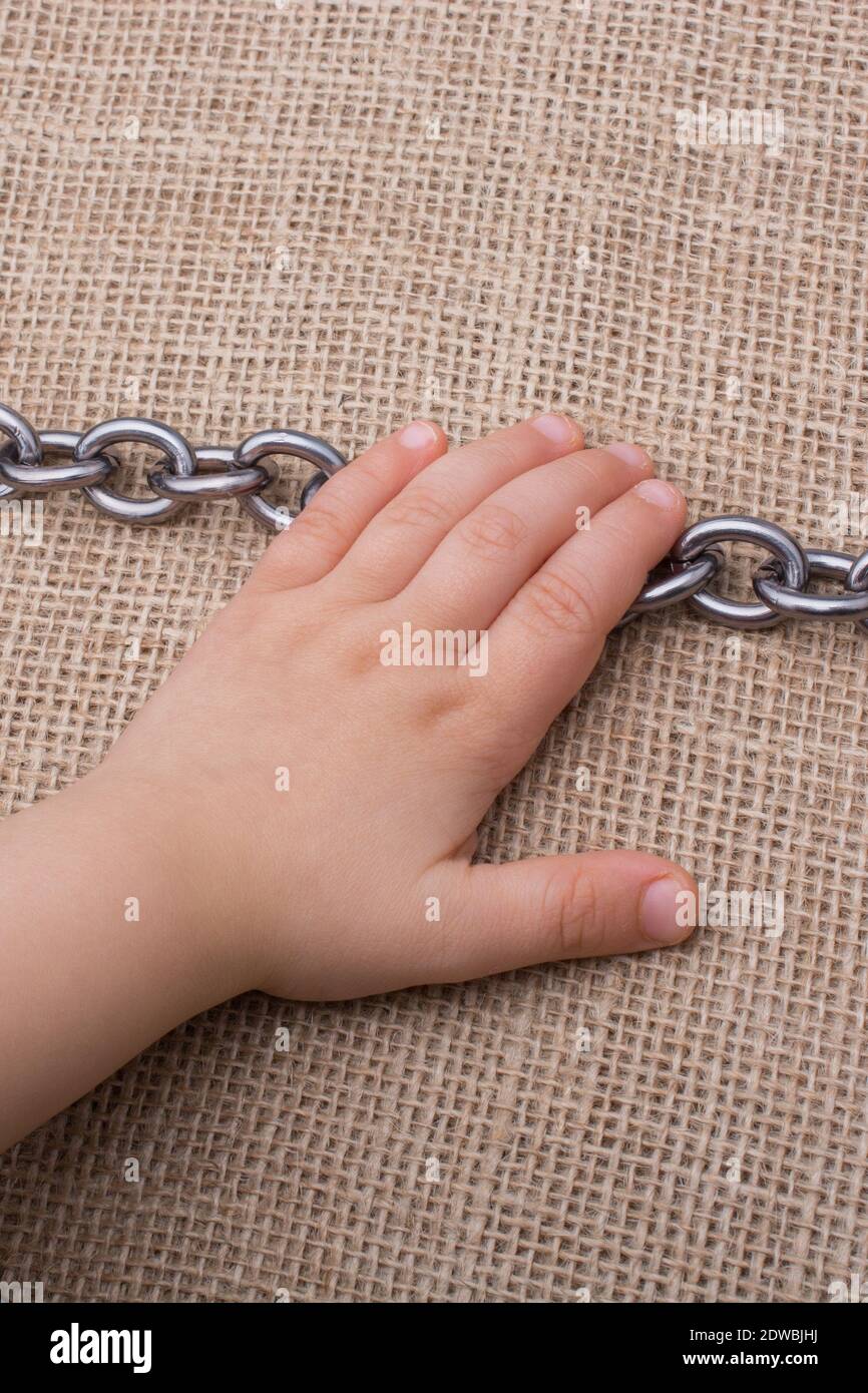 Child chain hi-res stock photography and images - Alamy