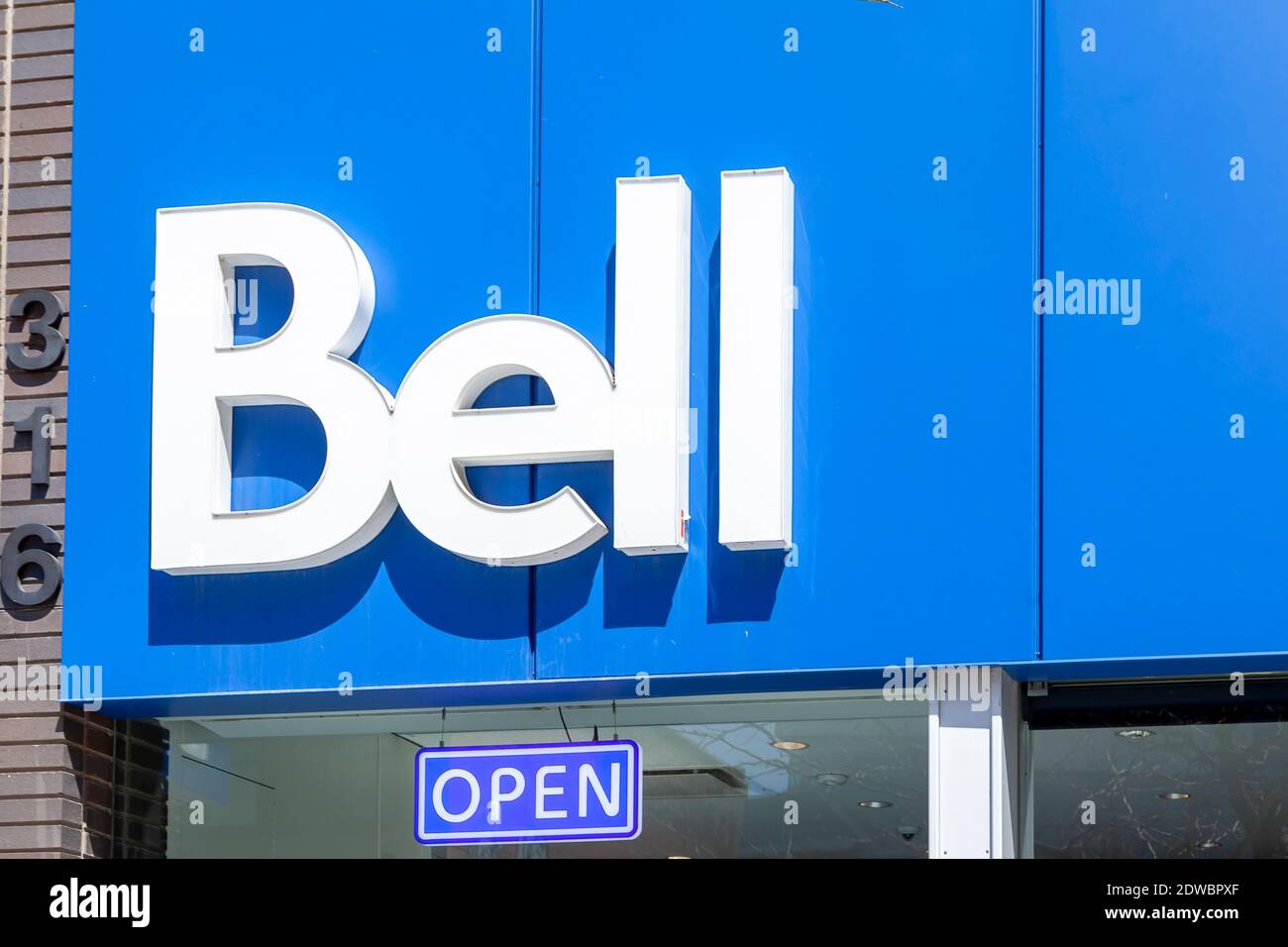 Toronto, Canada - May 16, 2020: Bell sign above the entrance of a Bell ...