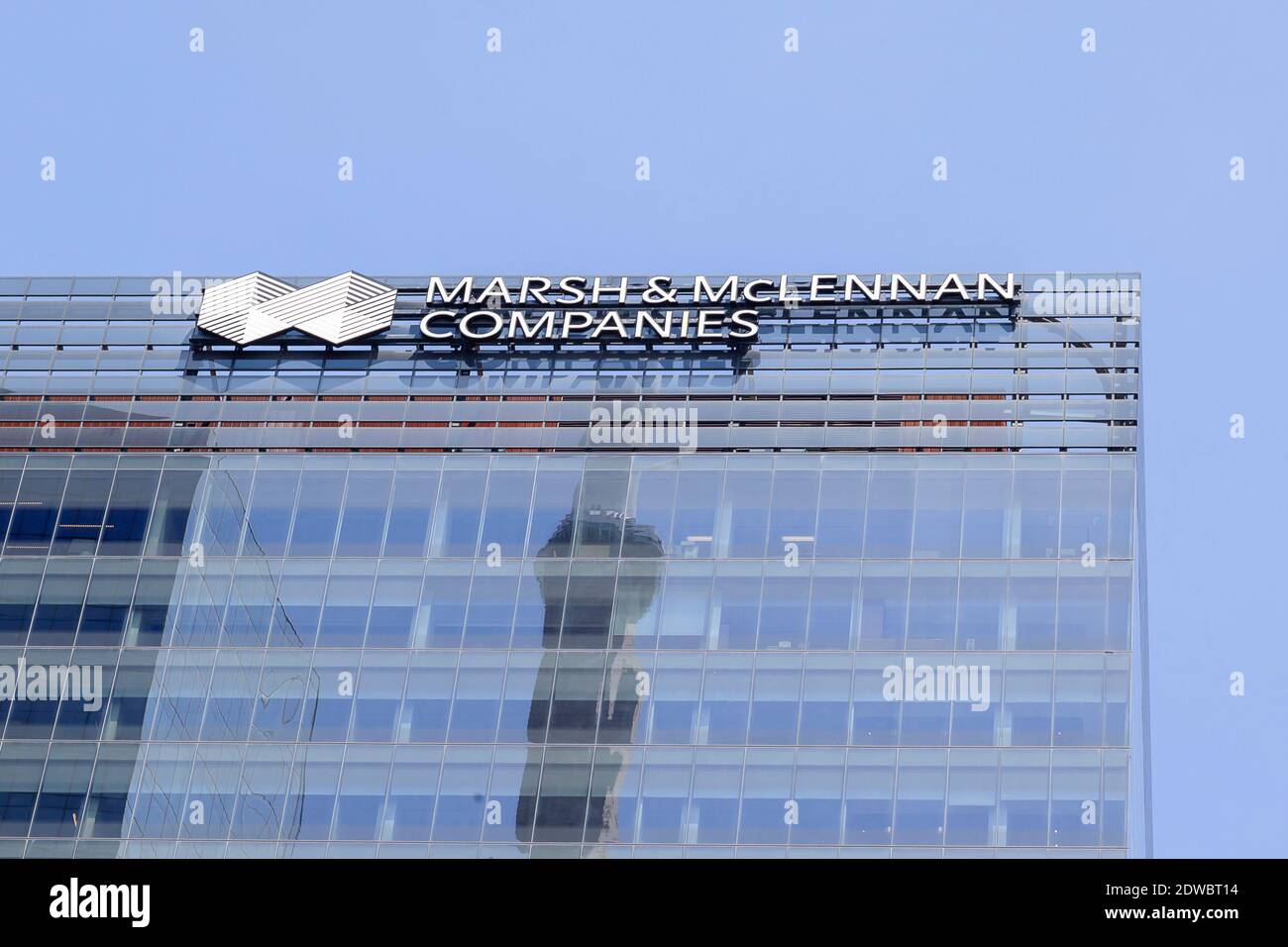 Marsh McLennan Companies sign on their office building in Toronto Stock ...