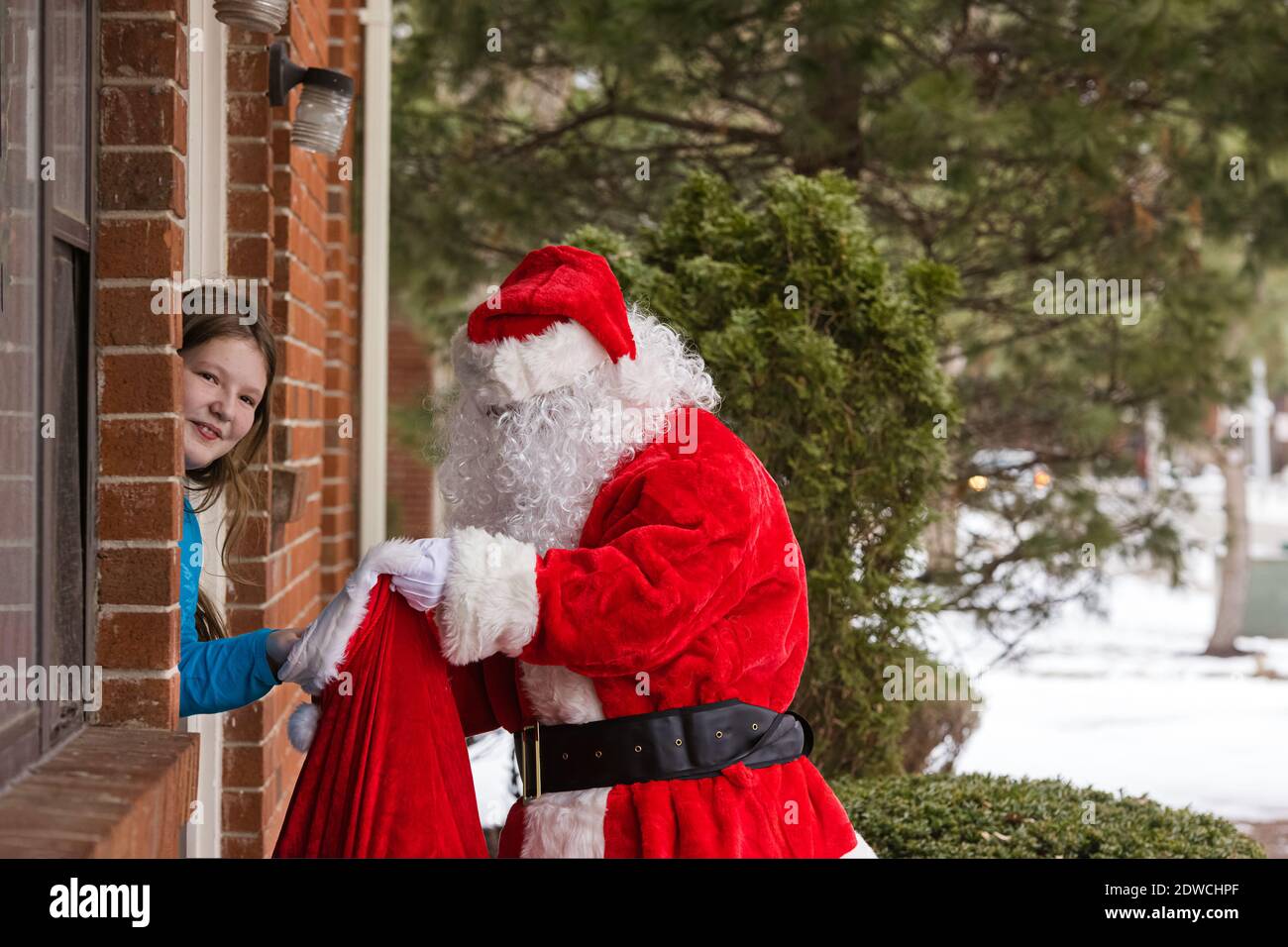 A of children giving gift box a santa claus celebrate x-mas christmas ...