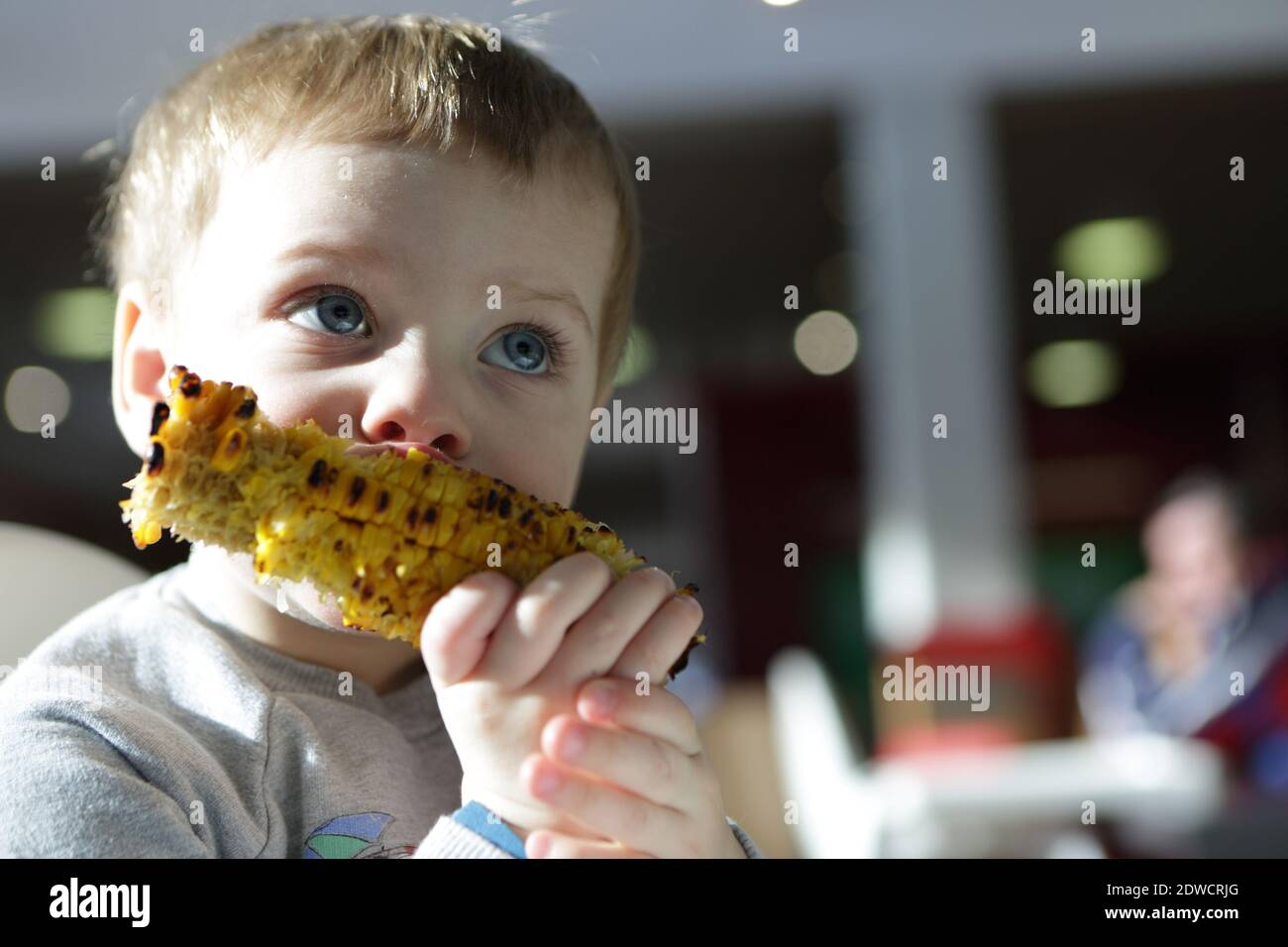 Corn cob in mouth hi-res stock photography and images - Alamy