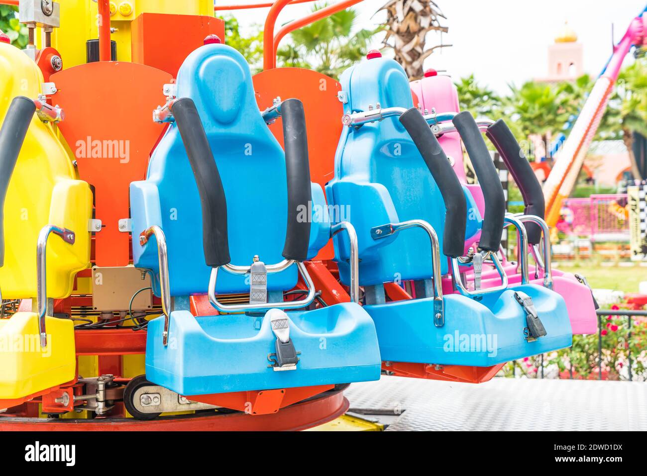 Empty amusement ride seats hi-res stock photography and images - Alamy