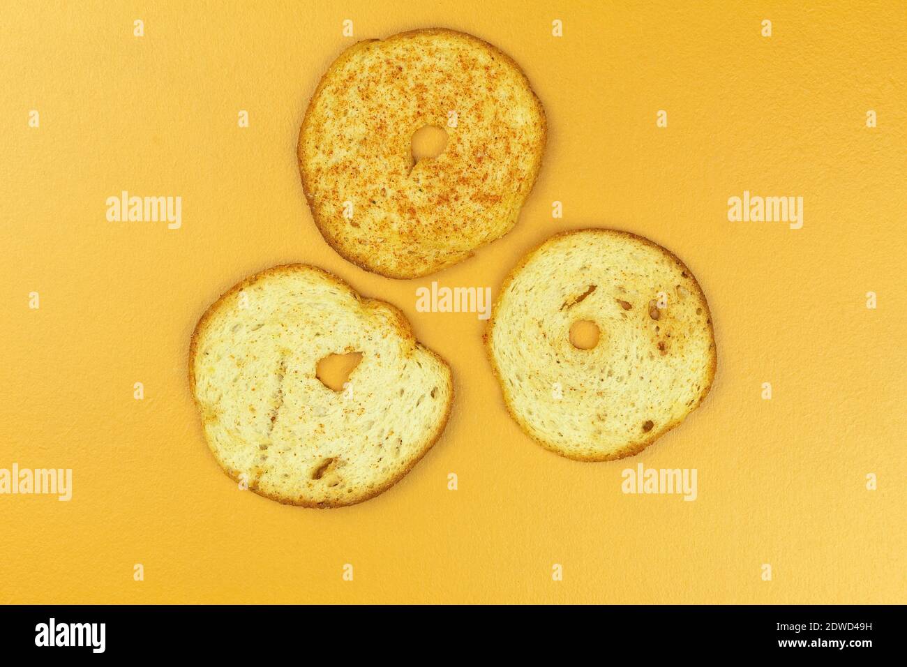 Round toasts of white bread. Fresh and crispy white bread croutons with ...