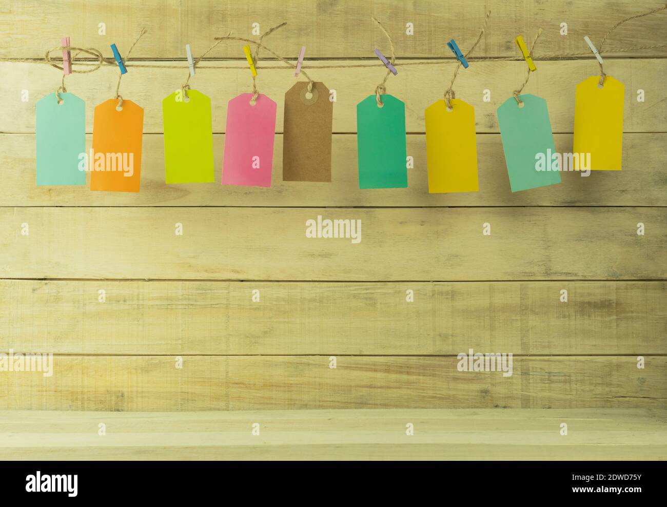 Labels in different colors as a background. Rope tags as background ...