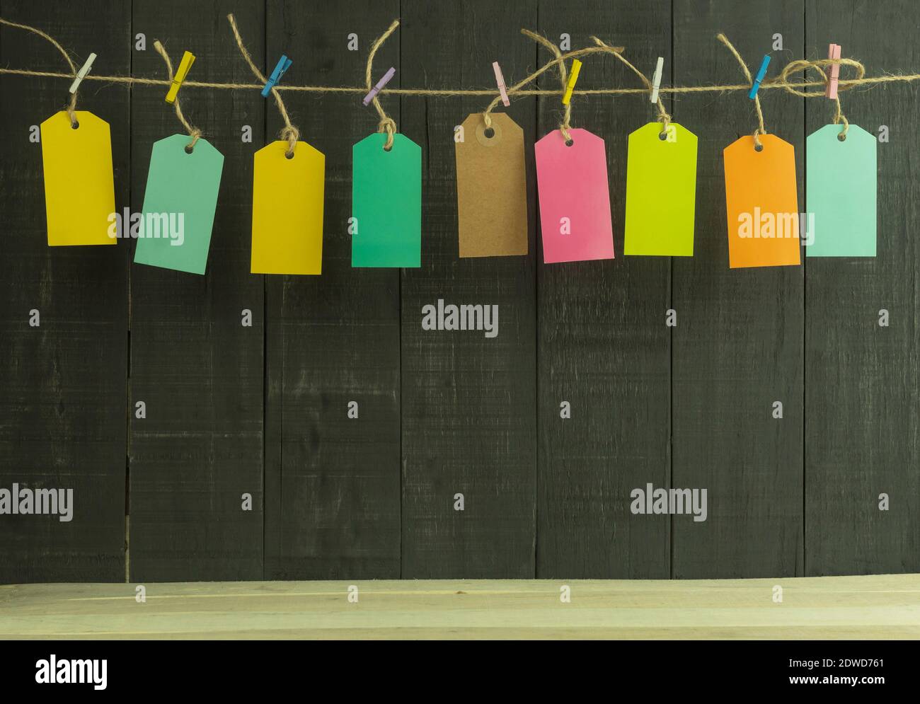 Labels in different colors as a background. Rope tags as background ...