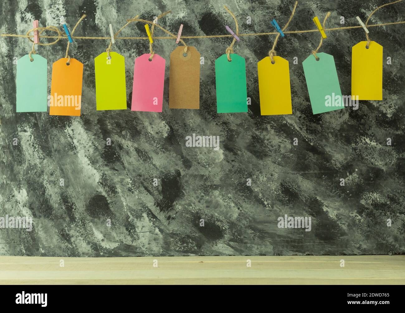 Labels in different colors as a background. Rope tags as background ...