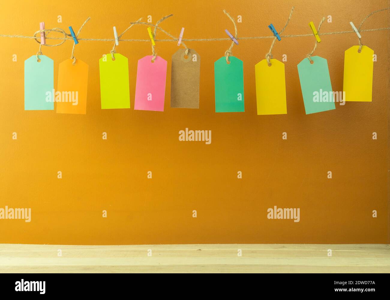 Labels in different colors as a background. Rope tags as background ...