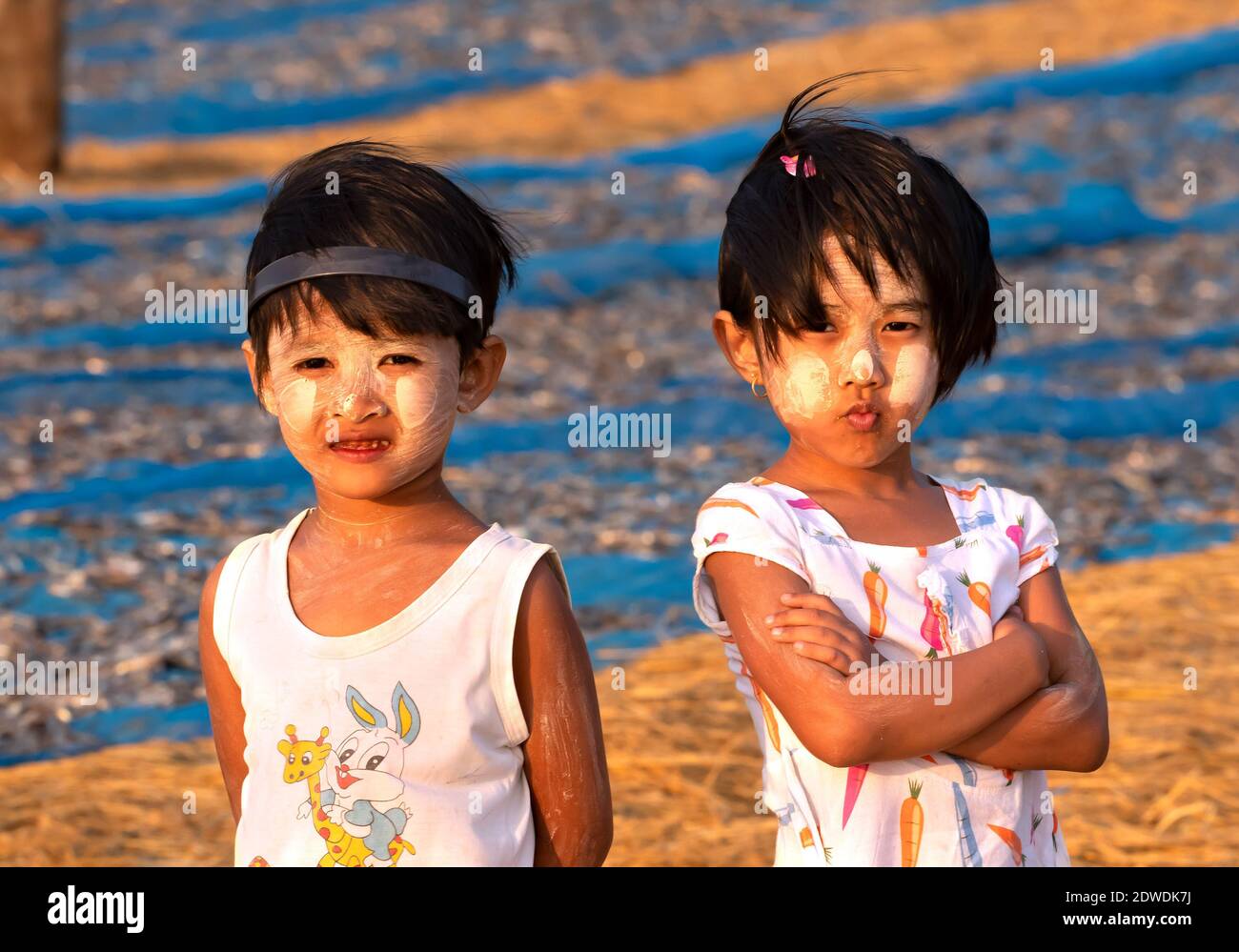 Brother and sister, the white stuff on their faces is sunscreen made ...