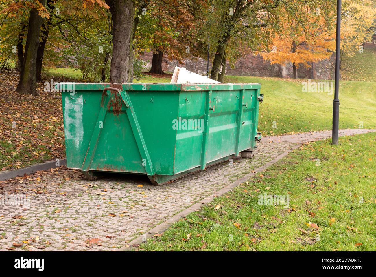 Container for collecting cut grass and fallen leaves. Large metal ...