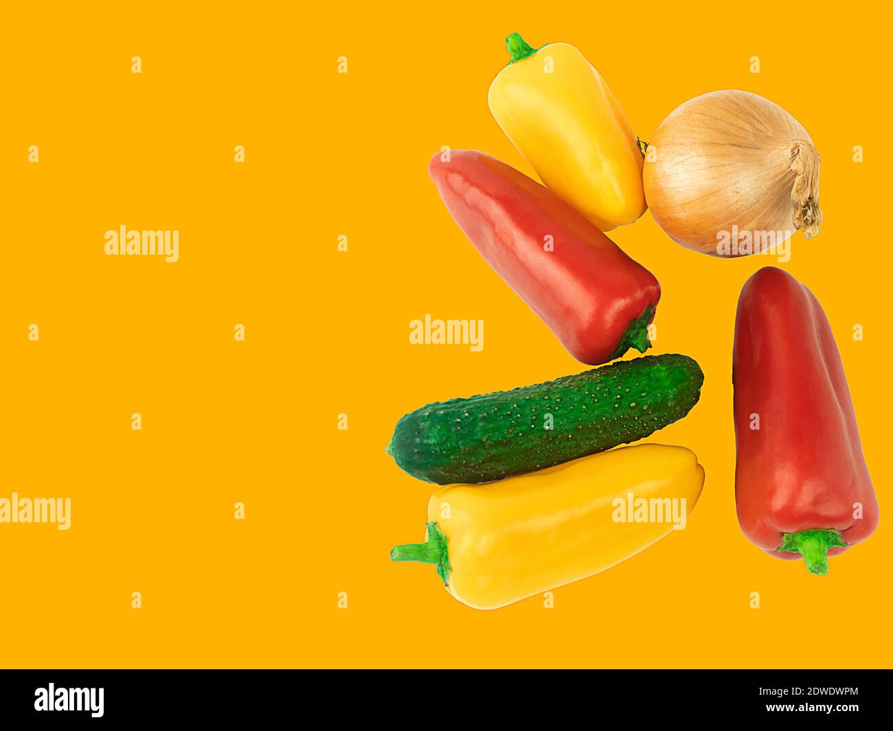 Fresh paprika on a yellow background. Fresh vegetables. Bell pepper ...