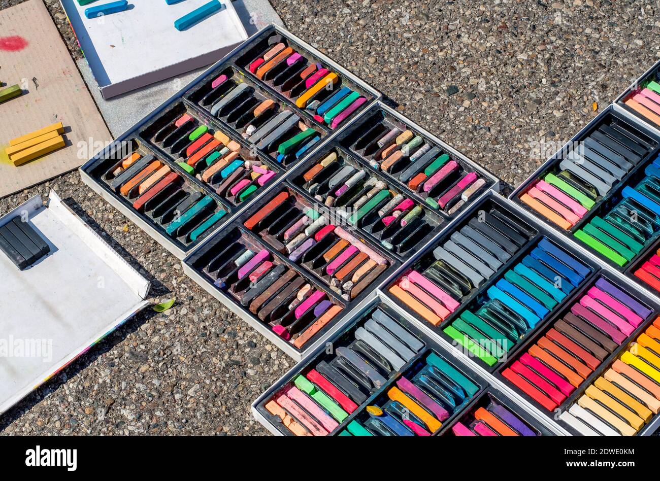 Boxes Of Pastels And Chalks Are Laid Out At An Outdoor Art Competition ...