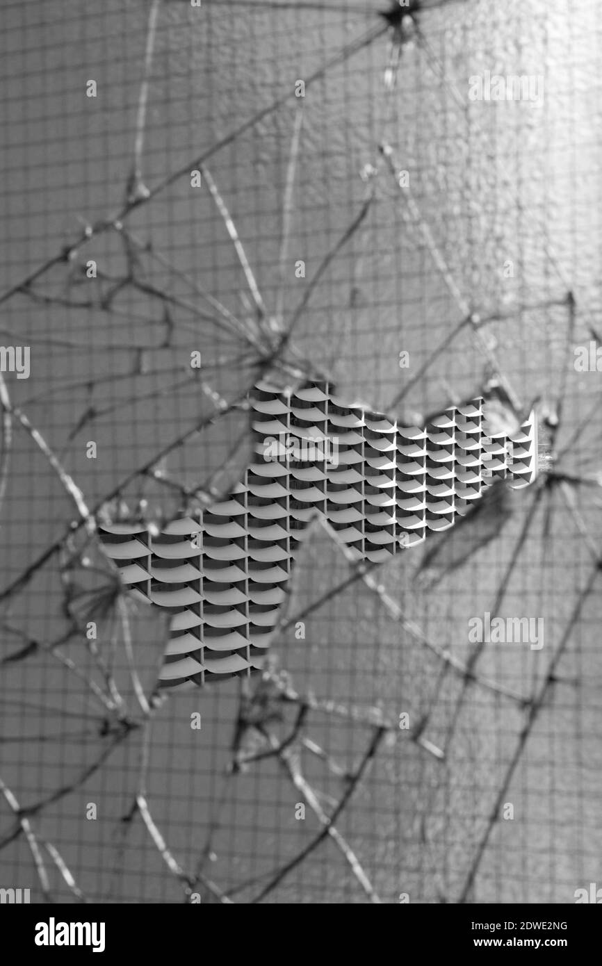 Broken smashed window Black and White Stock Photos & Images - Alamy