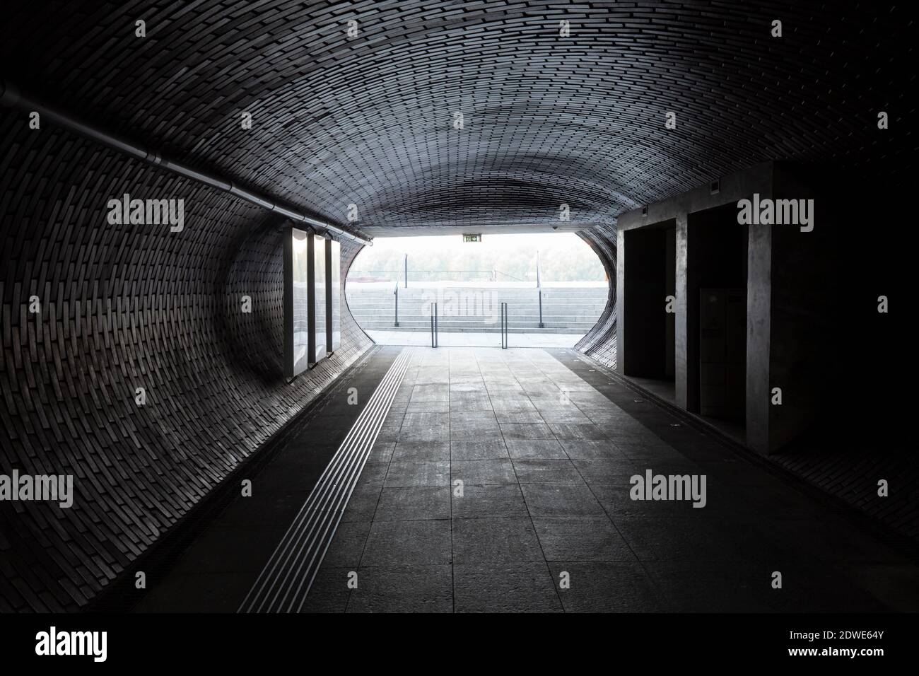 A pedestrian crossing in the form of a tunnel. Arched underground ...