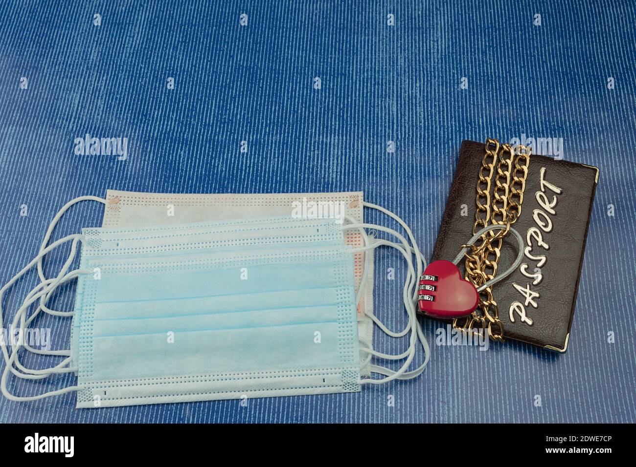 Chain with a heart-shaped lock on the passport. Code lock with chain on ...