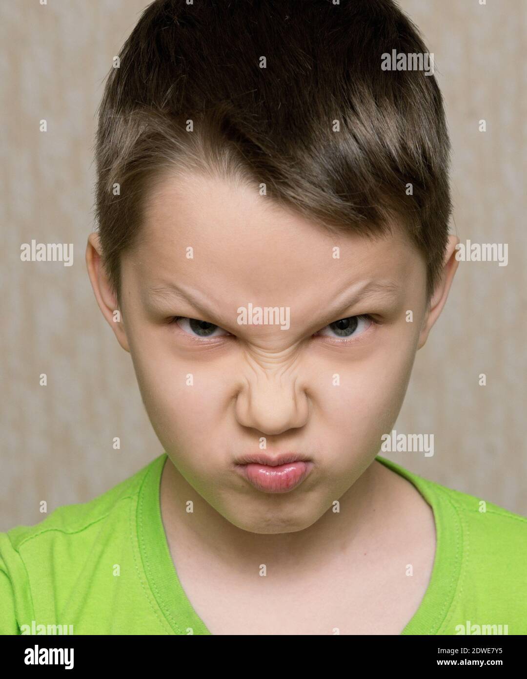 Portrait of angry boy Stock Photo - Alamy