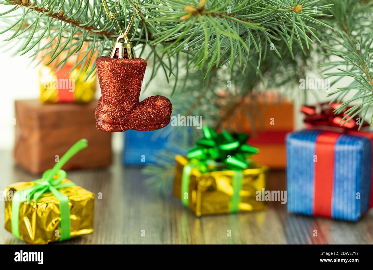 Christmas and New Year's gifts under the tree. Gifts under the tree ...