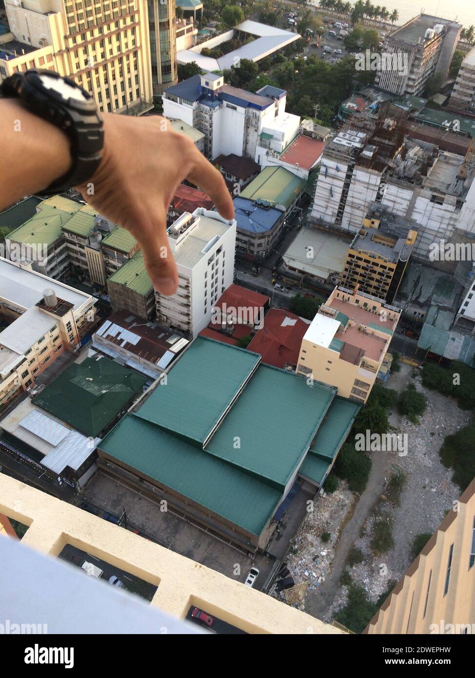 Hand holding building hi-res stock photography and images - Alamy