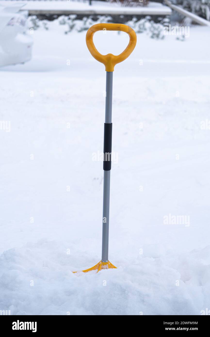 Clearing snow from driveway after heavy winter storm Stock Photo - Alamy
