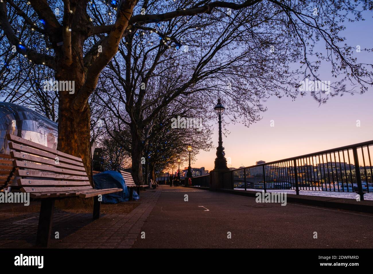 London city centre and its buildings during a pink sunset in a clear ...