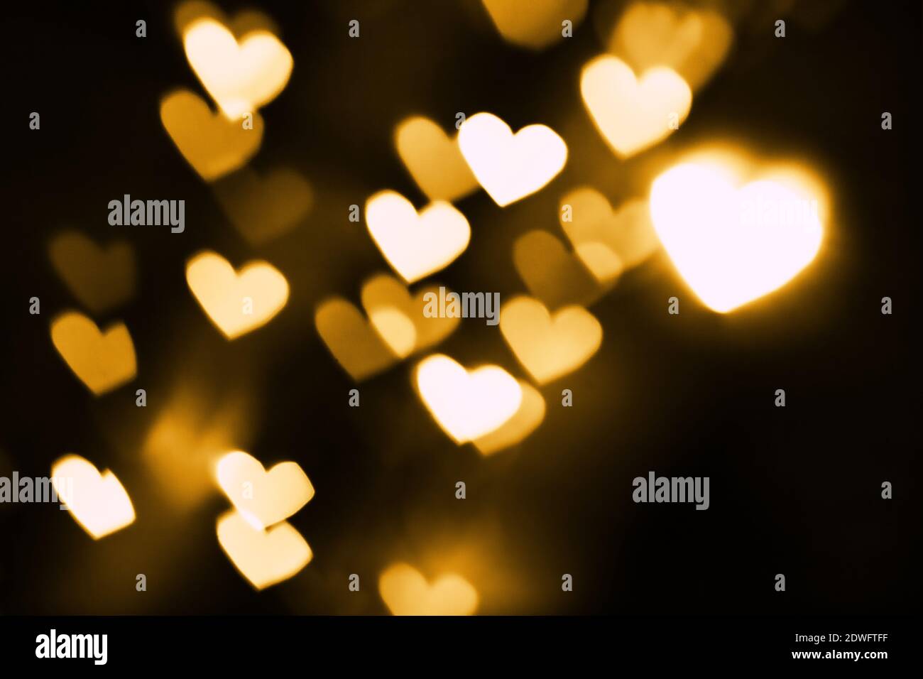 Gold heart background hi-res stock photography and images - Alamy
