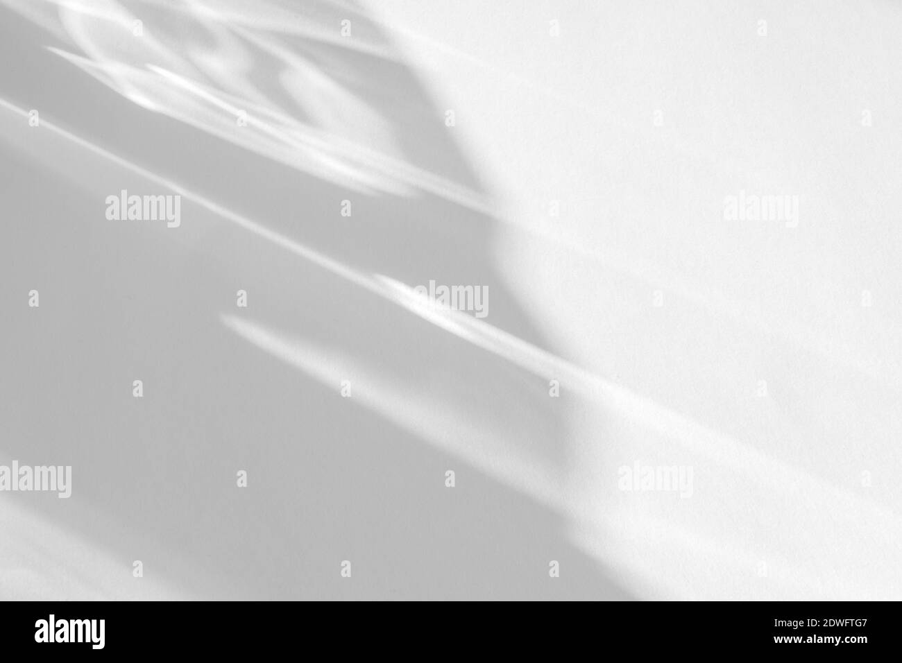 shadow and light caustic effect on a white wall Stock Photo - Alamy