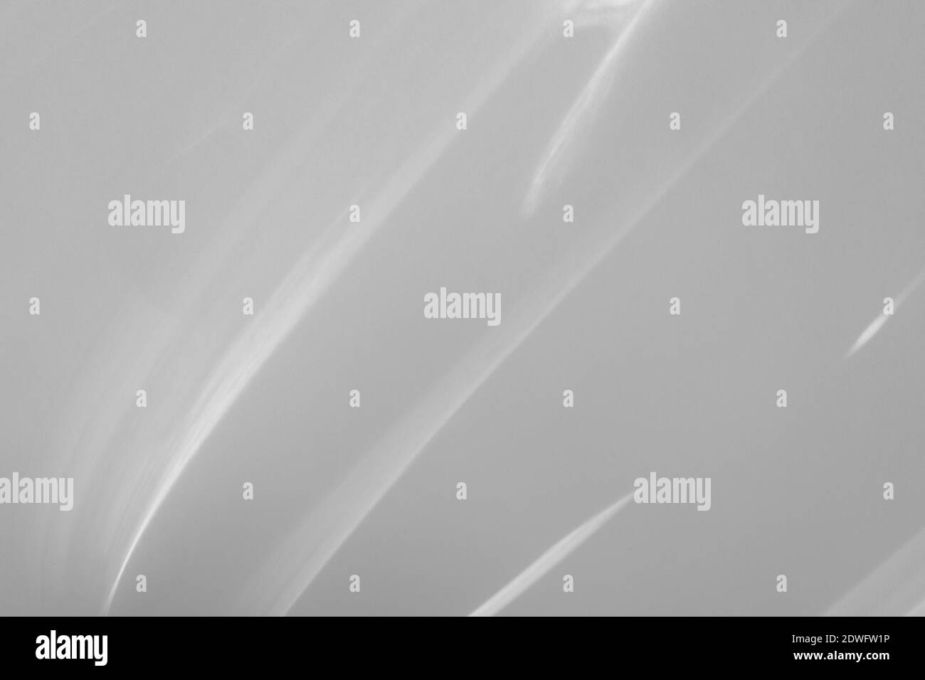 shadow and light caustic effect on a white wall Stock Photo - Alamy