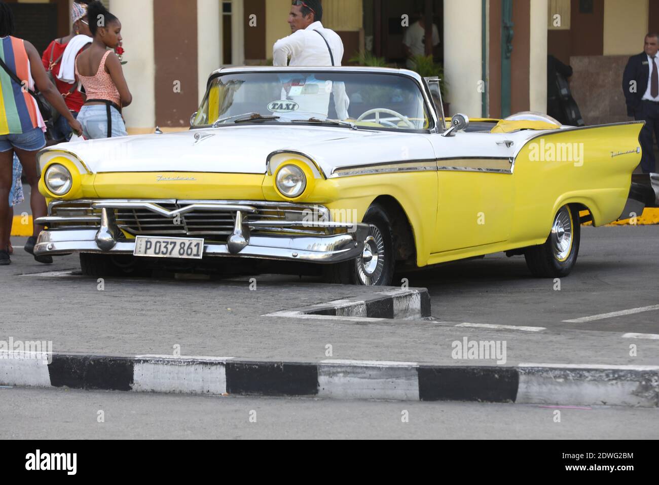 Classic American yellow car one of streets in Havana, where old cars ...