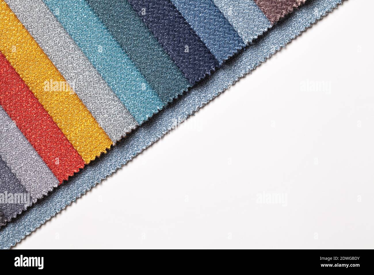 Sample of textile various colors, background on white table with copy ...