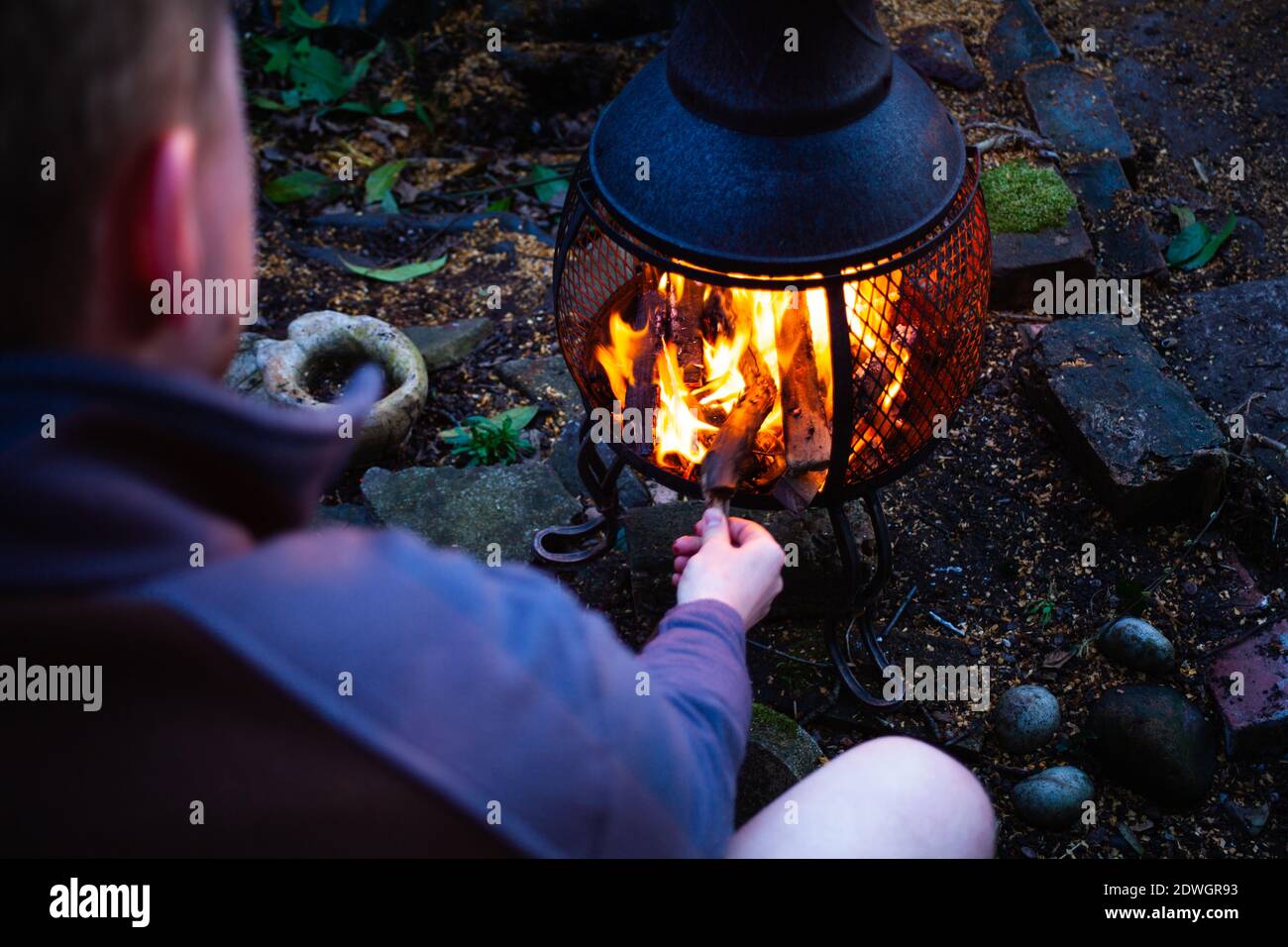 Warming hand over fire hi-res stock photography and images - Alamy