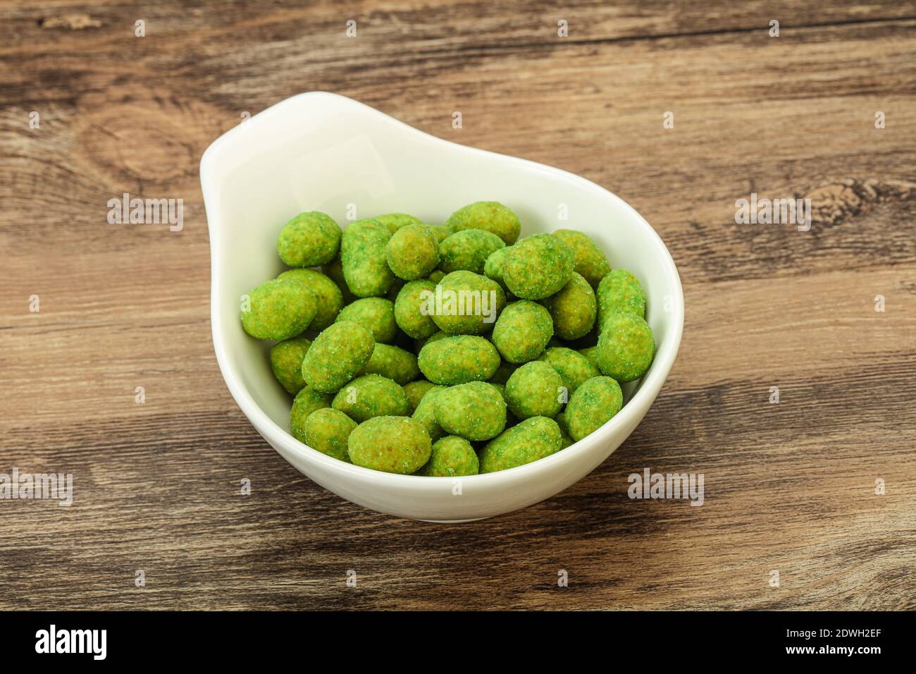 Spicy wasabi peanuts snack in the bowl Stock Photo - Alamy