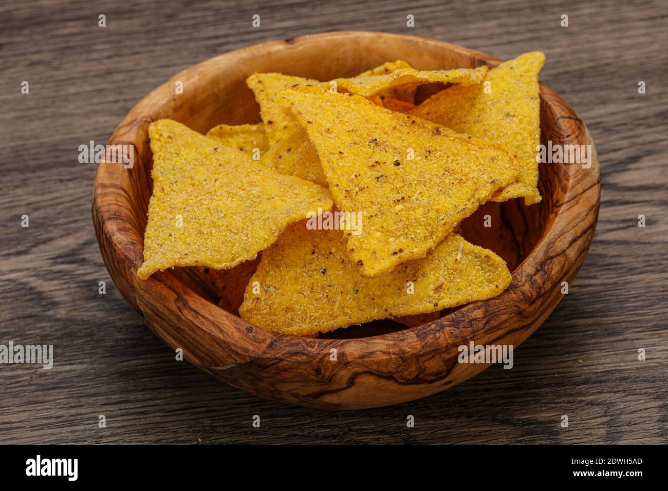 Mexican crunchy corn nachos triangle heap Stock Photo - Alamy