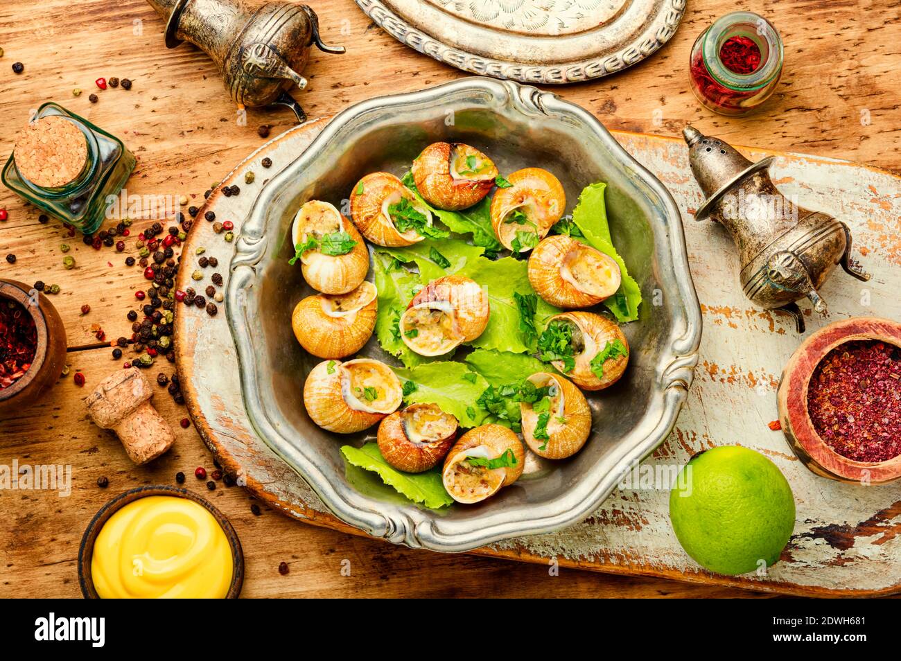 Snail or escargots with garlic butter and lime.Baked snails Stock Photo ...