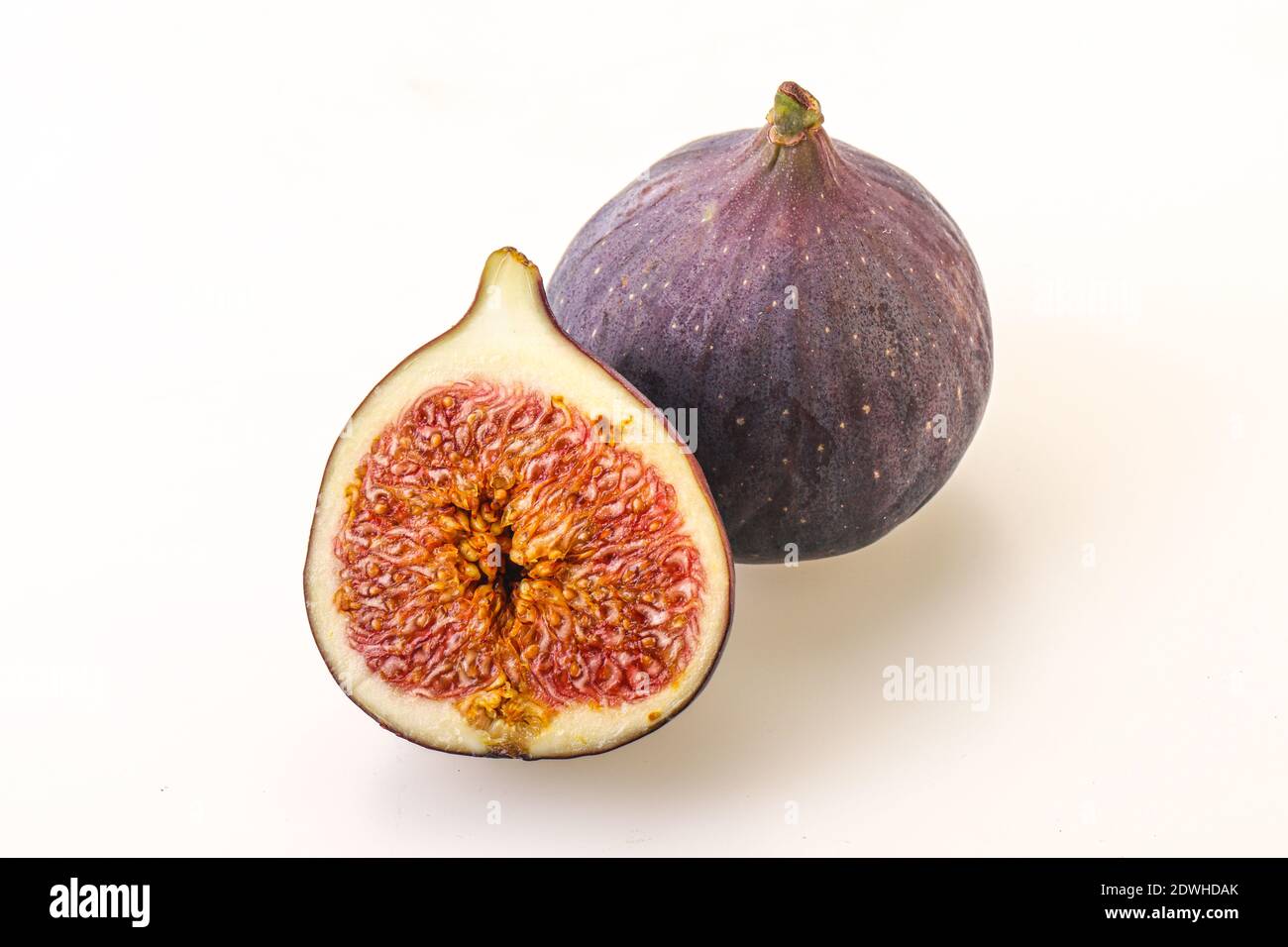 Sweet purple slice of fig fruit Stock Photo - Alamy