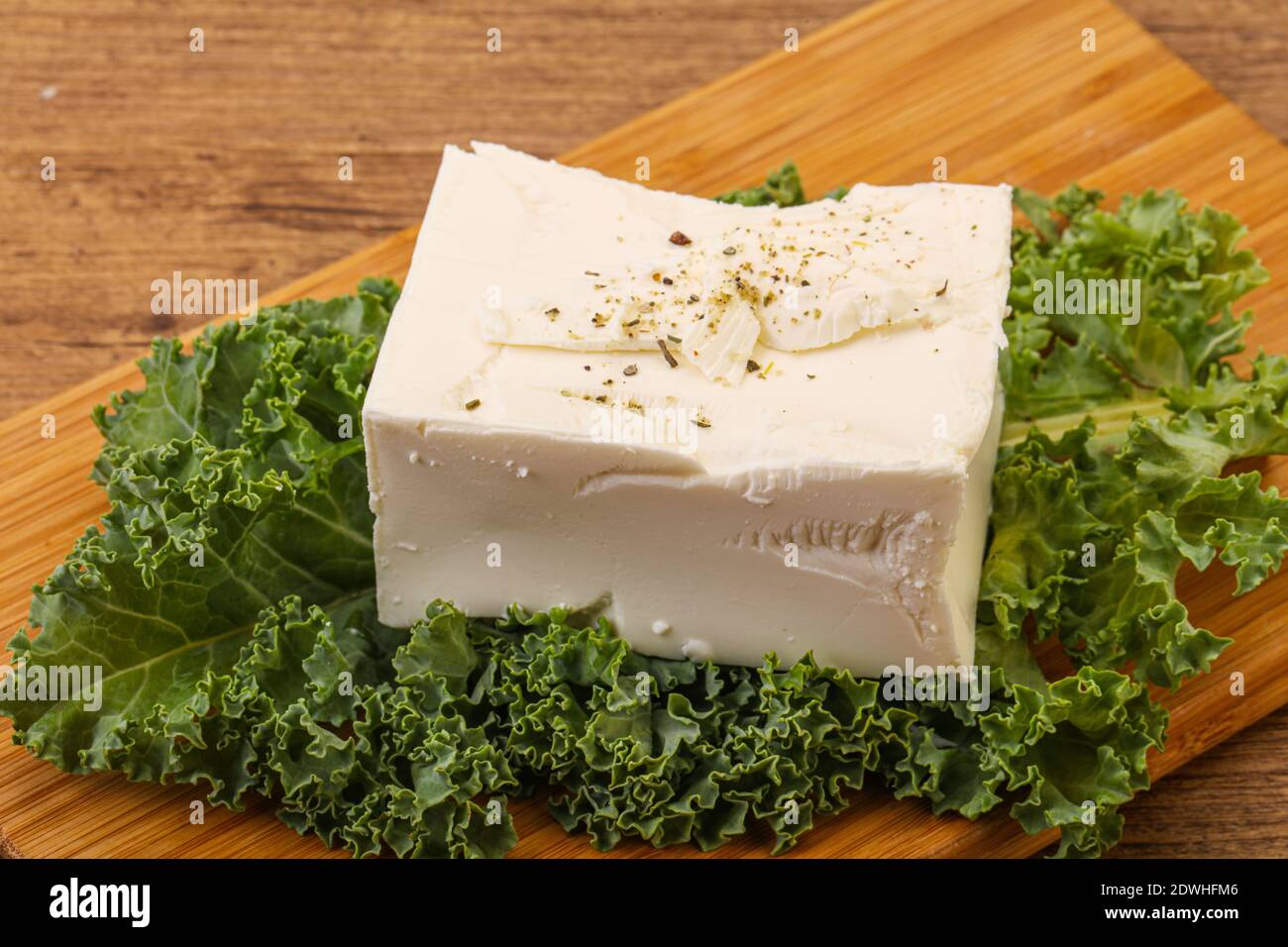 Traditional tasty Greek Feta soft cheese brick Stock Photo - Alamy