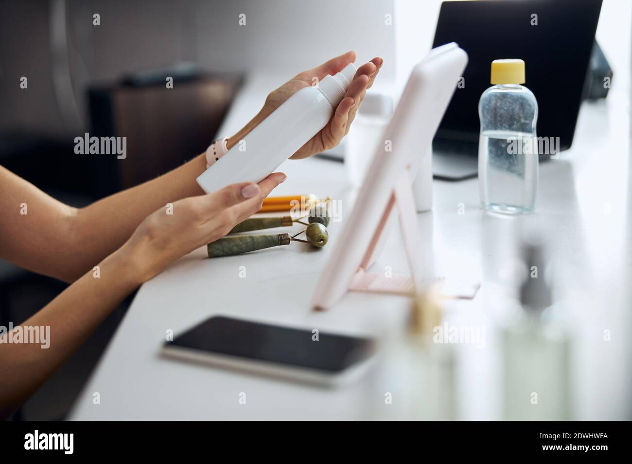 Woman cream applying arms hi-res stock photography and images - Alamy