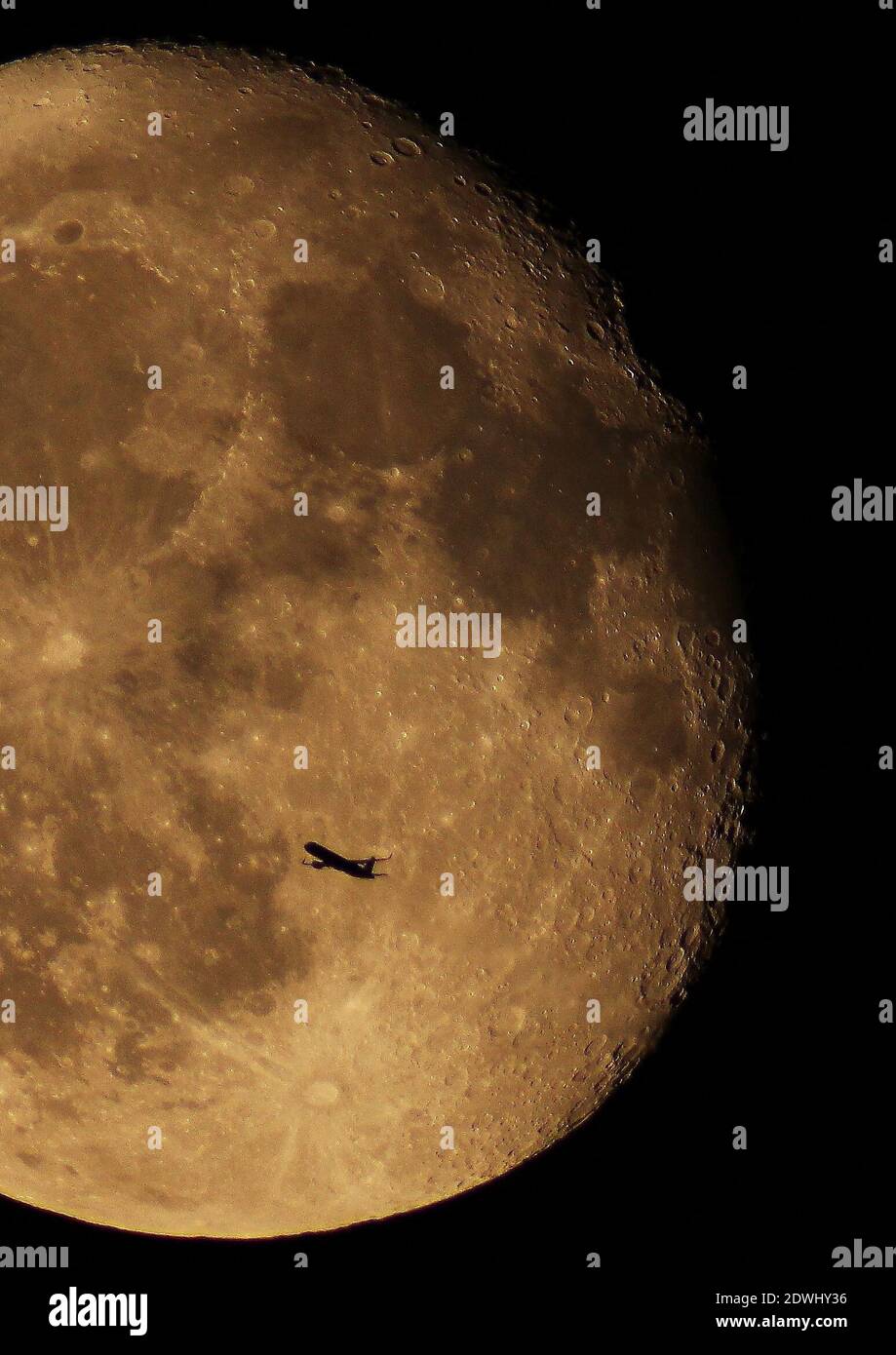 Flying with moon hi-res stock photography and images - Alamy