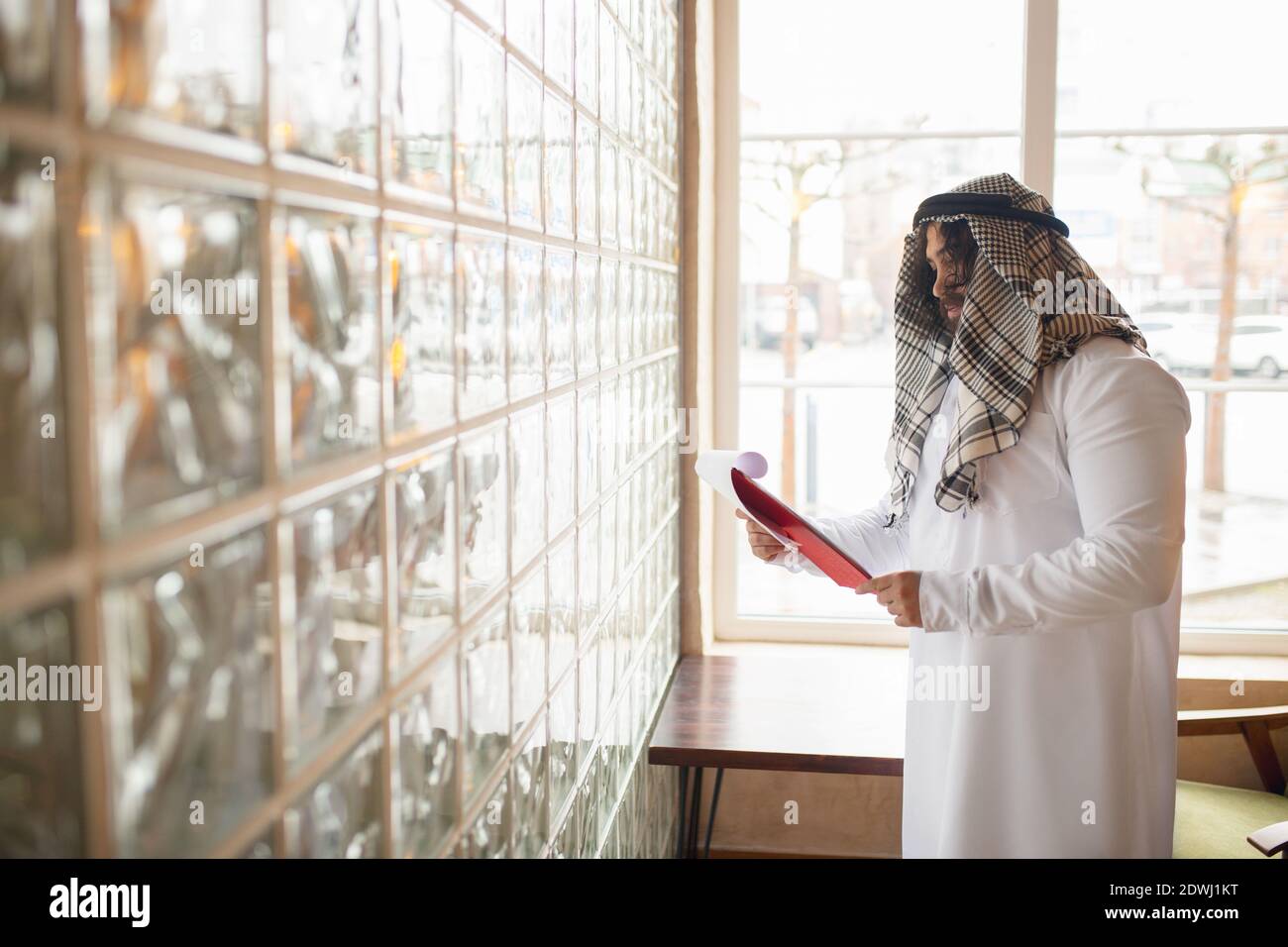 Offers. Arabian businessman working in office, business centre using ...