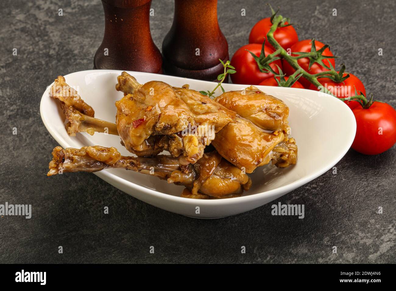 Rabbit stew in sweet and spicy sauce Stock Photo - Alamy