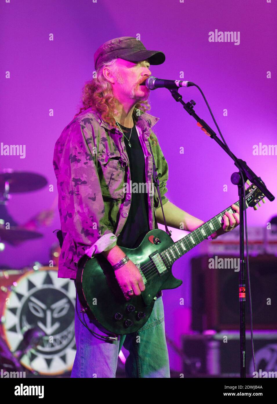 Guitarist, Simon Friend of The Levellers performing at the Larmer Tree ...